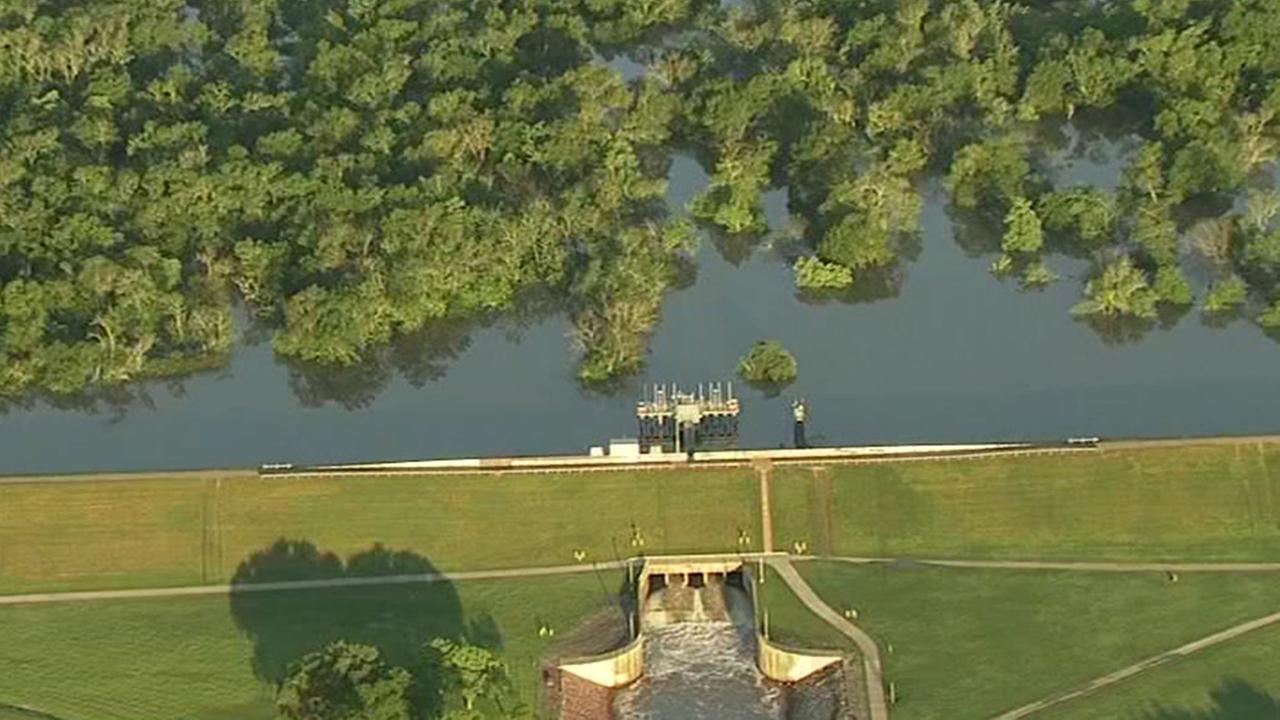 Water-filled Addicks, Barker reservoirs in west Houston under close ...