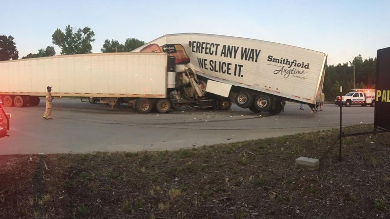 Truck Driver Has Minor Injuries After This Incredible Crash