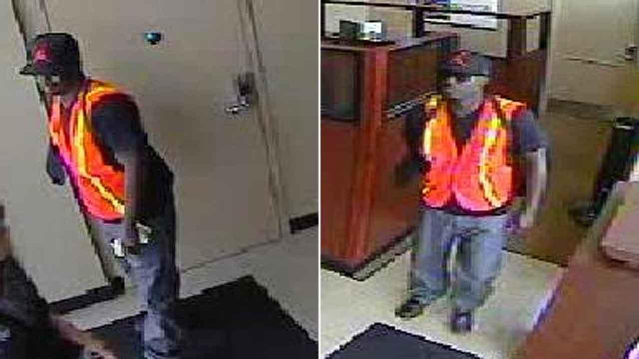 Armed bank robber in bright orange vest gets away with cash from ...